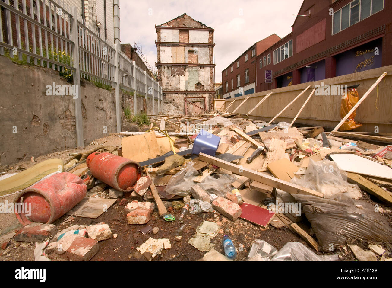 Illegally dumped rubbish on waste land in preston Stock Photo - Alamy