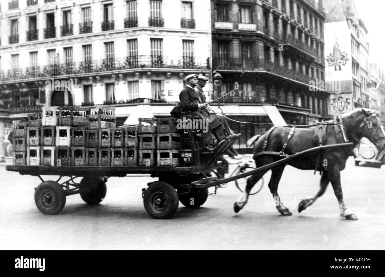 Horse-drawn cart carrying crates of drink, German-occupied Paris, July ...
