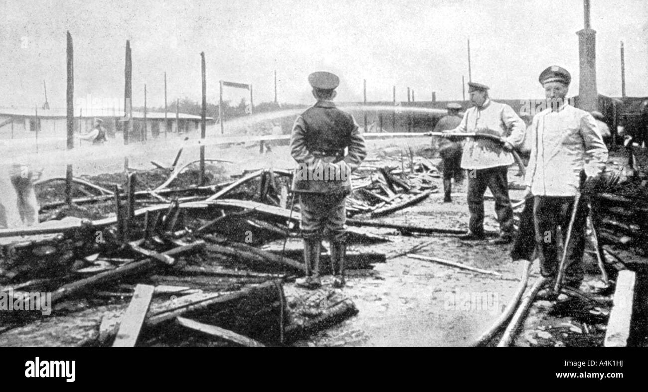 A fire damaged prison camp in Germany, World War I, 1915. Artist ...