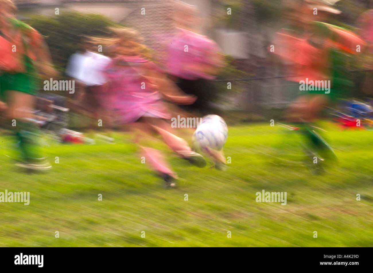 girl s soccer game action Stock Photo - Alamy