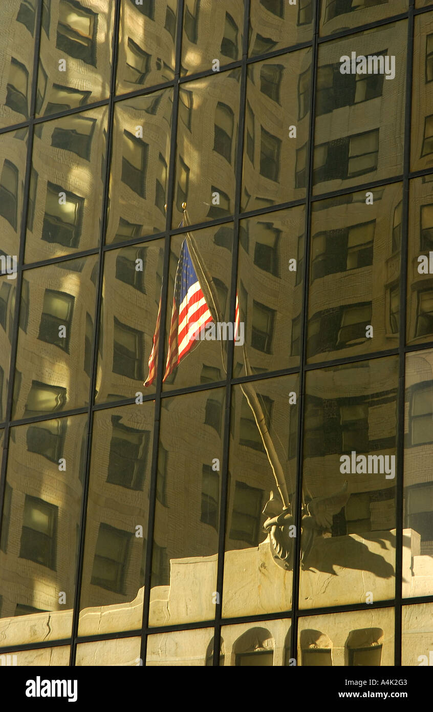 The american flag reflected in an appartment block window near the ...