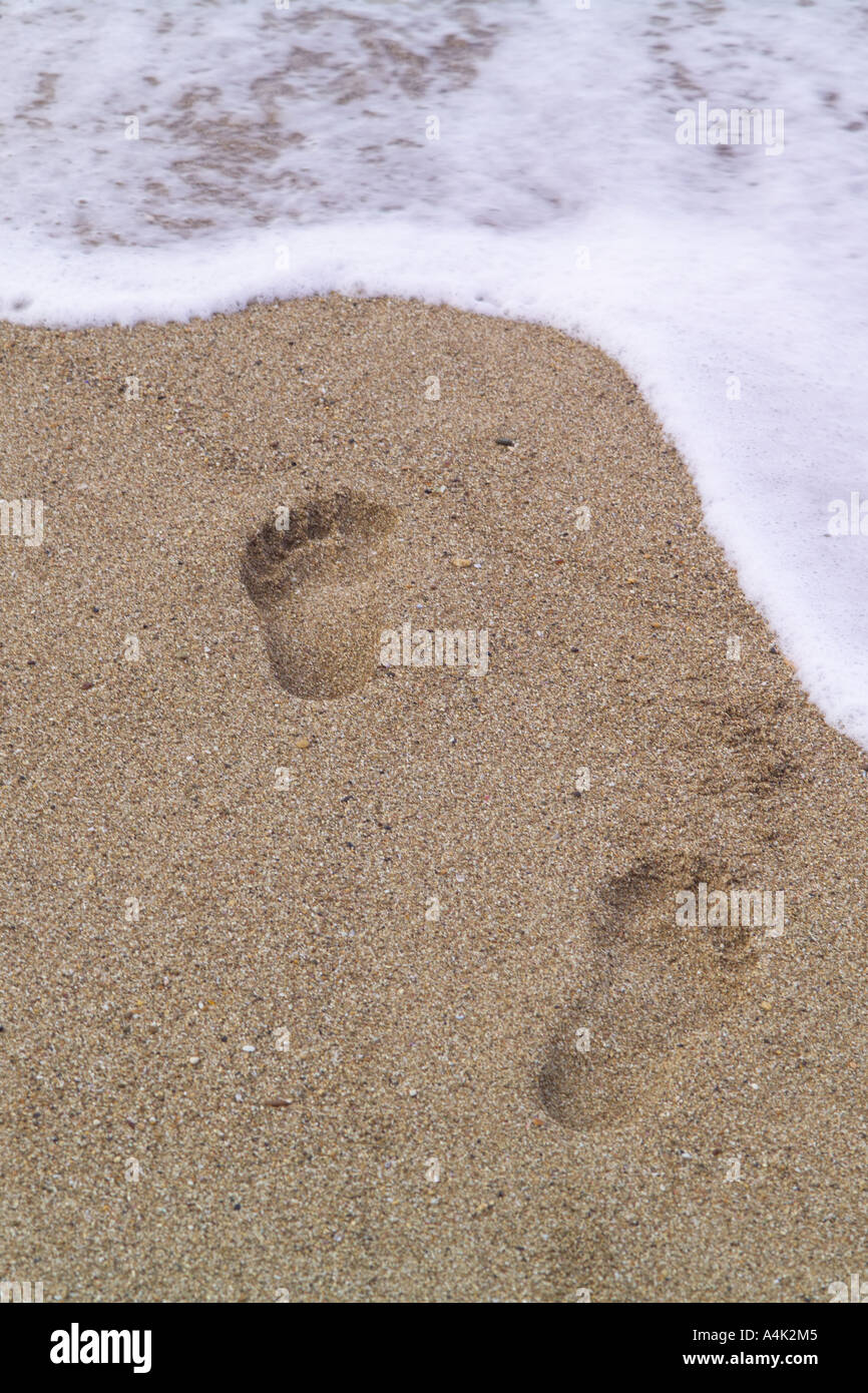 Foot prints in the sand on a Puerto Rican beach Stock Photo - Alamy
