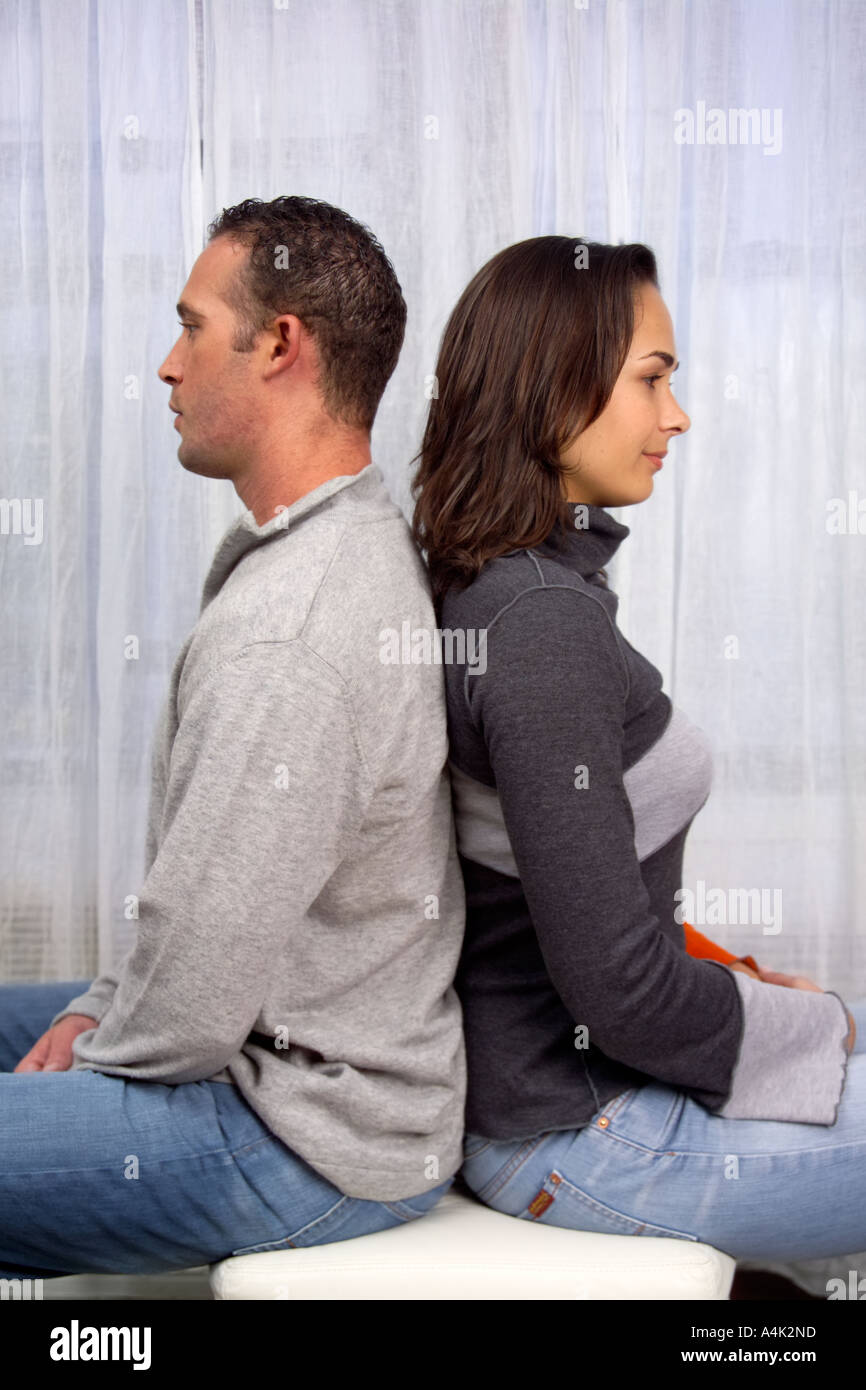 couple back to back Stock Photo - Alamy