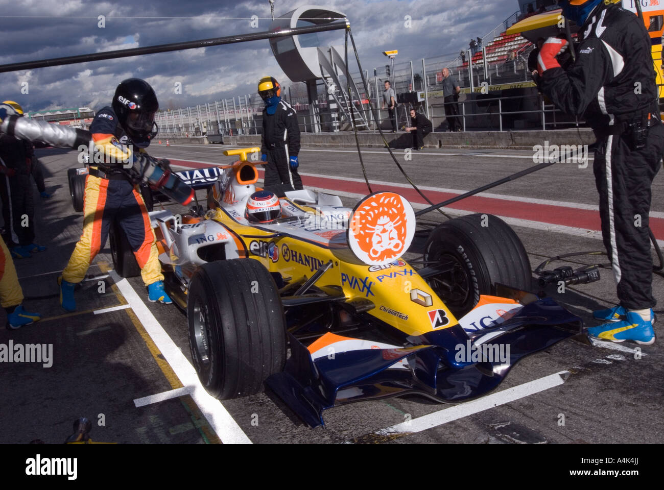 Heikki Kovalainen FIN in his Renault R27 during a pitstop at the track ...