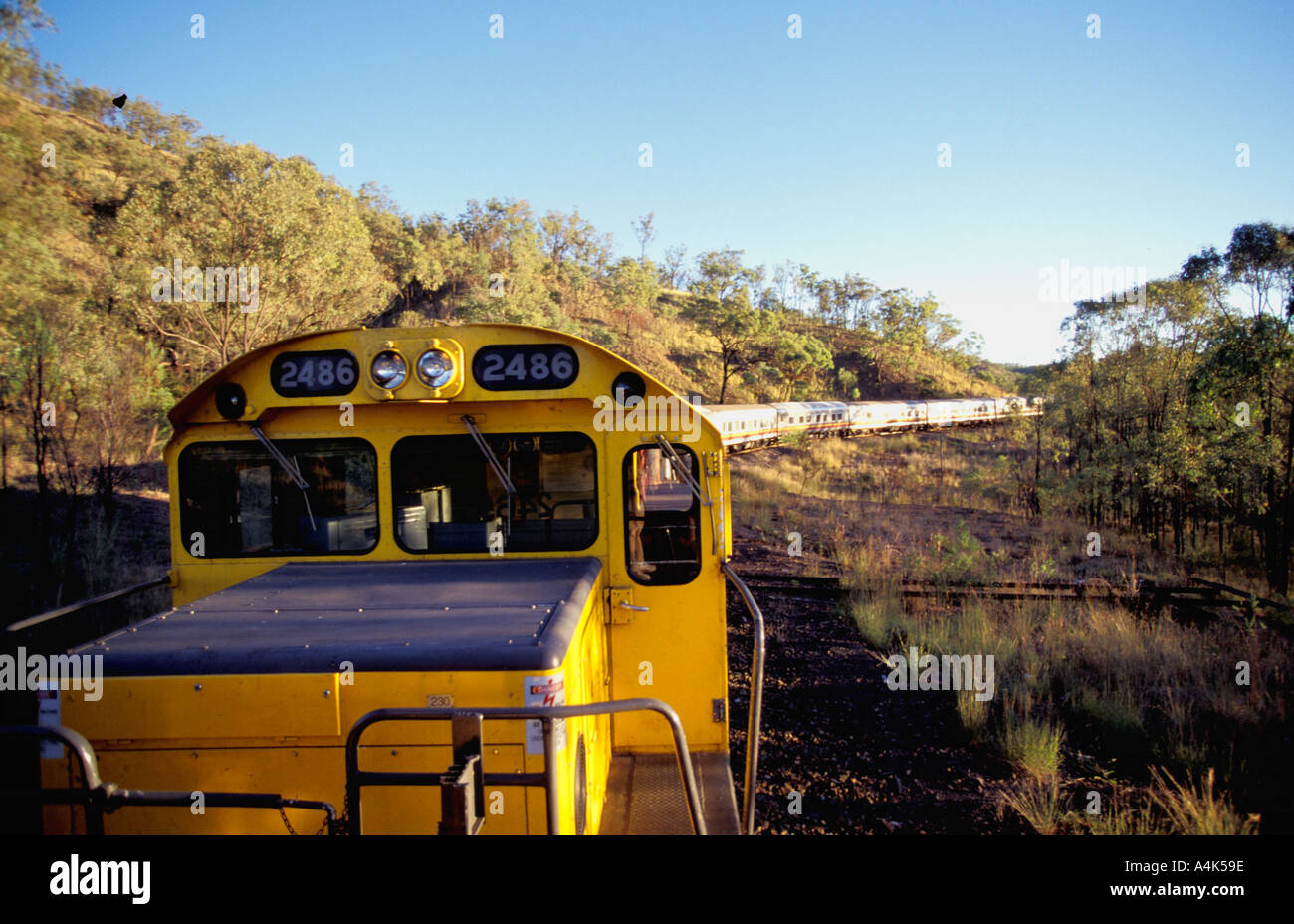 train driving through remote Outback Queensland Stock Photo - Alamy