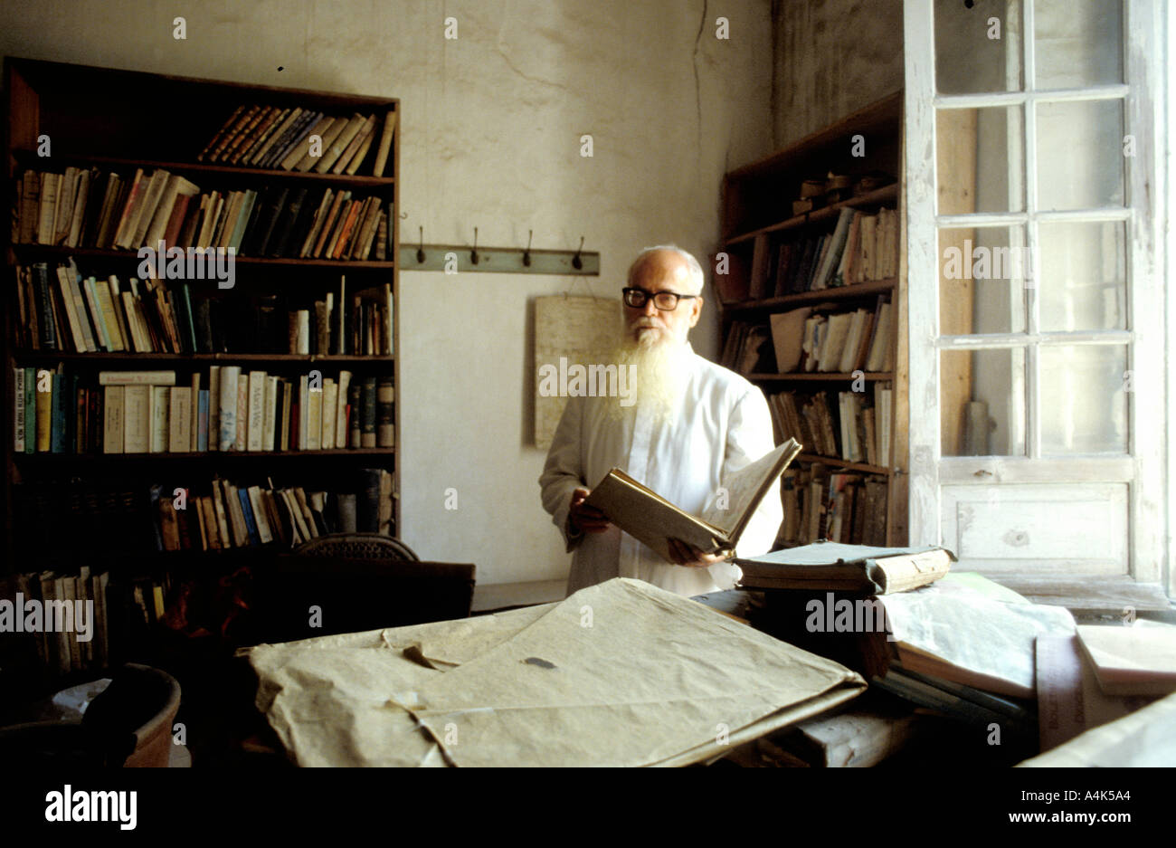 monk in his cell and study room Stock Photo - Alamy