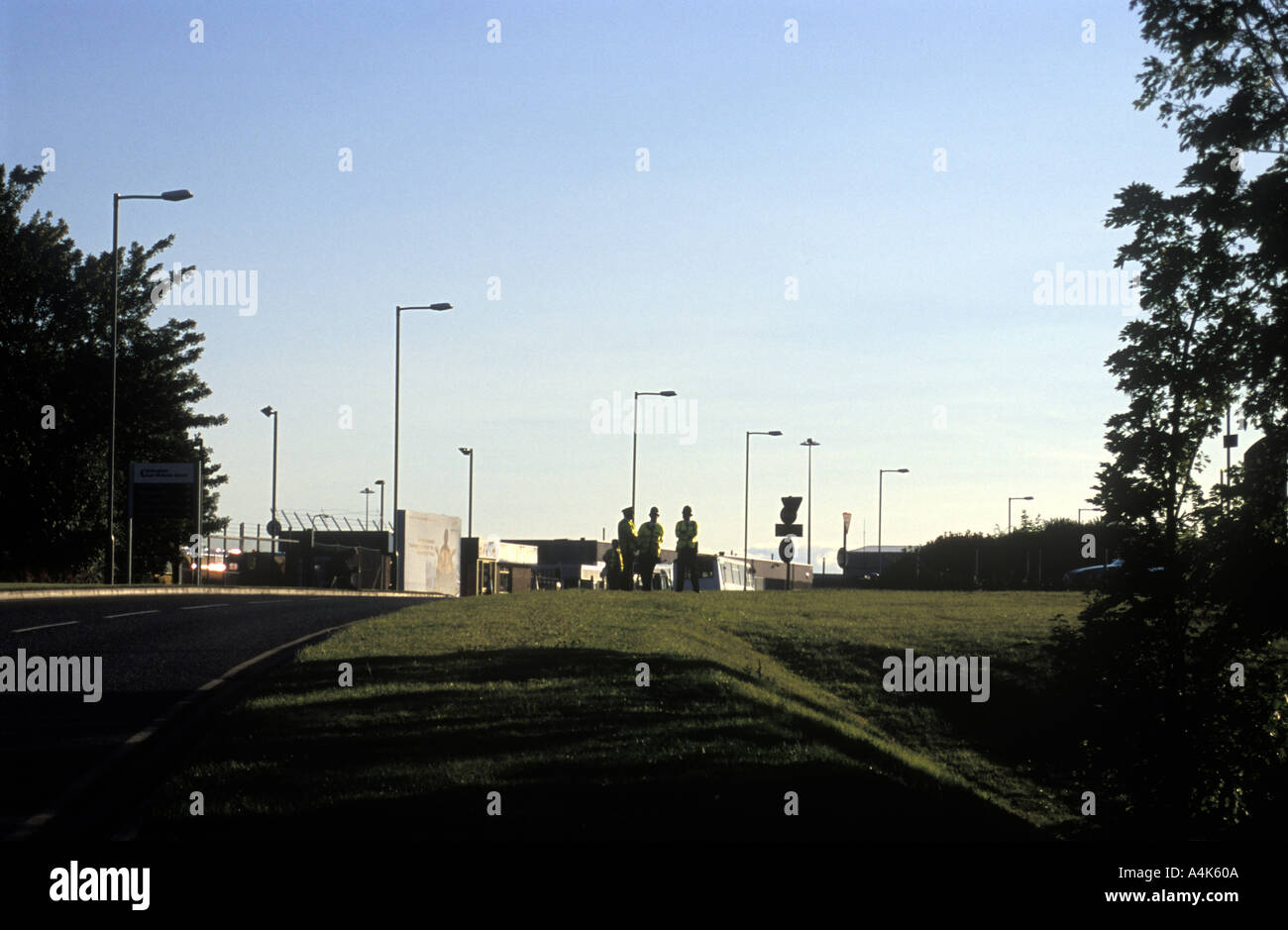 Police offices guard airport perimeter during security alert Stock ...