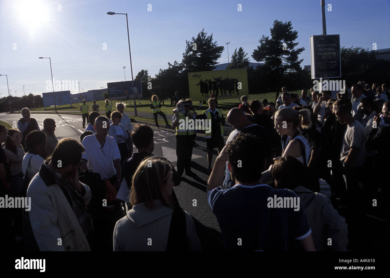 Police officer addresses passengers evacuated from airport during ...