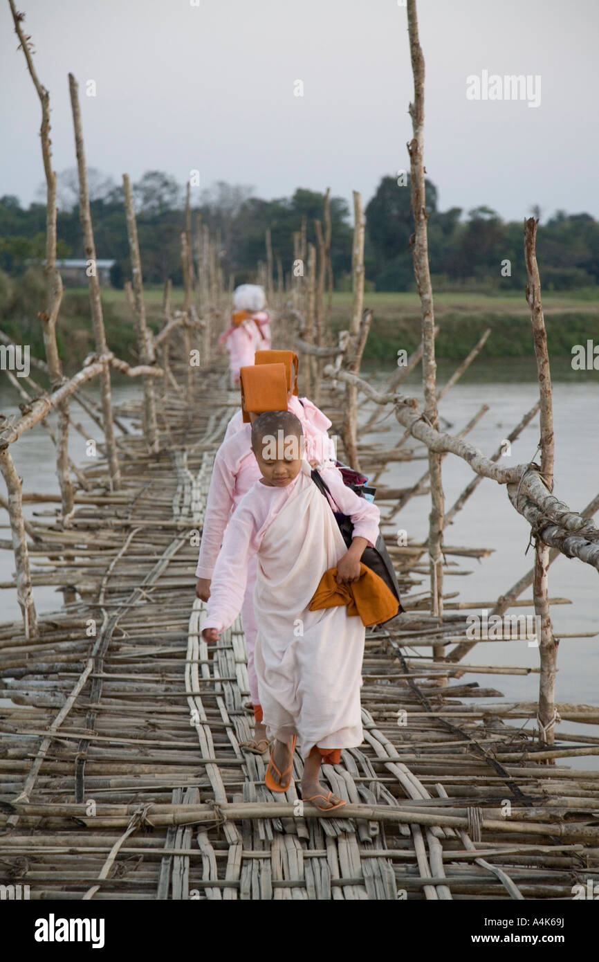 Young Nuns on Bamboobridge, Bamaw, Bhamo, Myanmar Stock Photo - Alamy