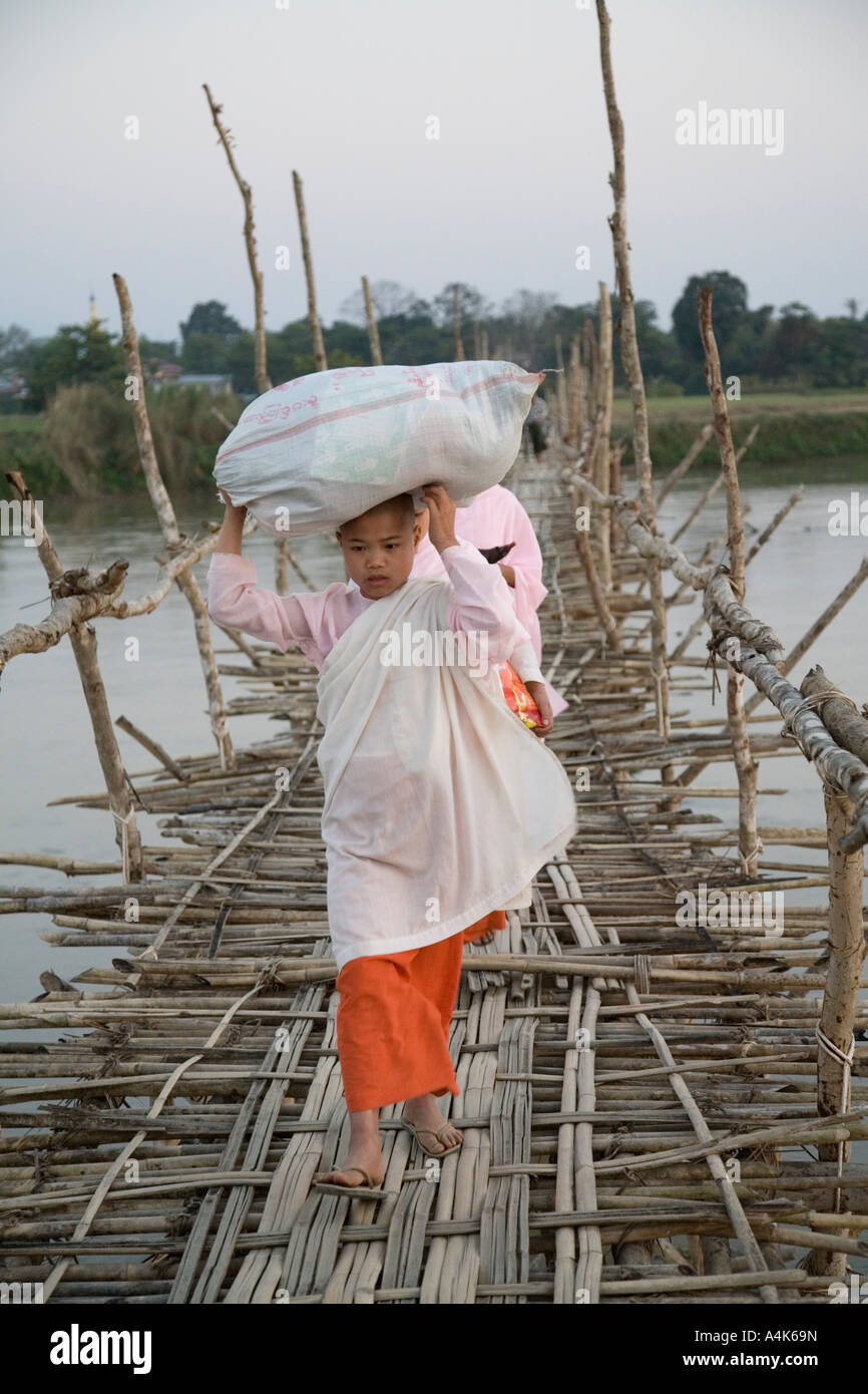 Young Nuns on Bamboobridge, Bamaw, Bhamo, Myanmar Stock Photo - Alamy