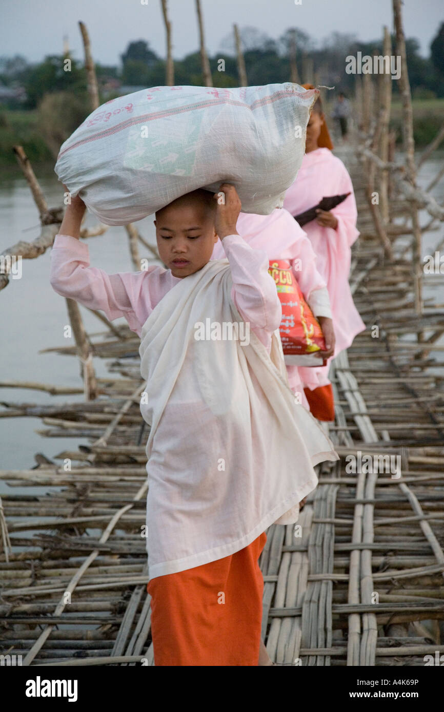 Young Nuns on Bamboobridge, Bamaw, Bhamo, Myanmar Stock Photo - Alamy