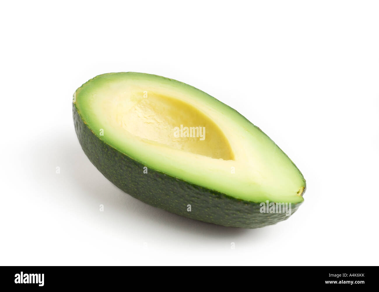 Side view of an avocado half isolated on a white background Stock Photo ...