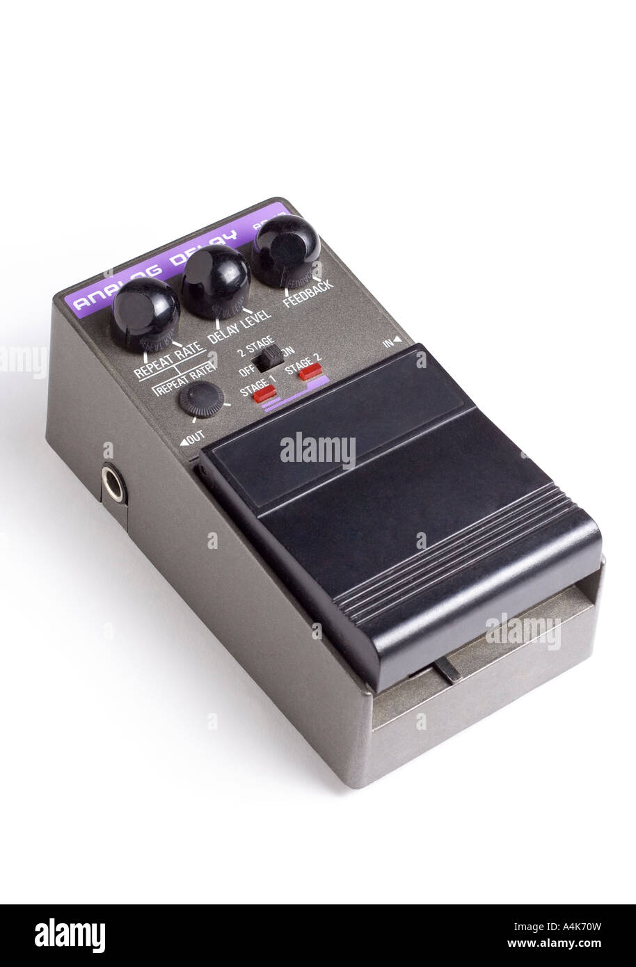 An analog delay guitar effects pedal isolated on a white background ...