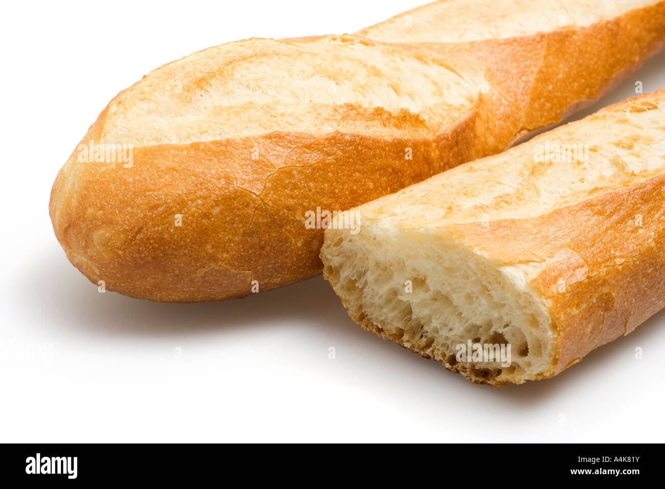 Closeup view of two french bread baguettes on a white background Stock ...