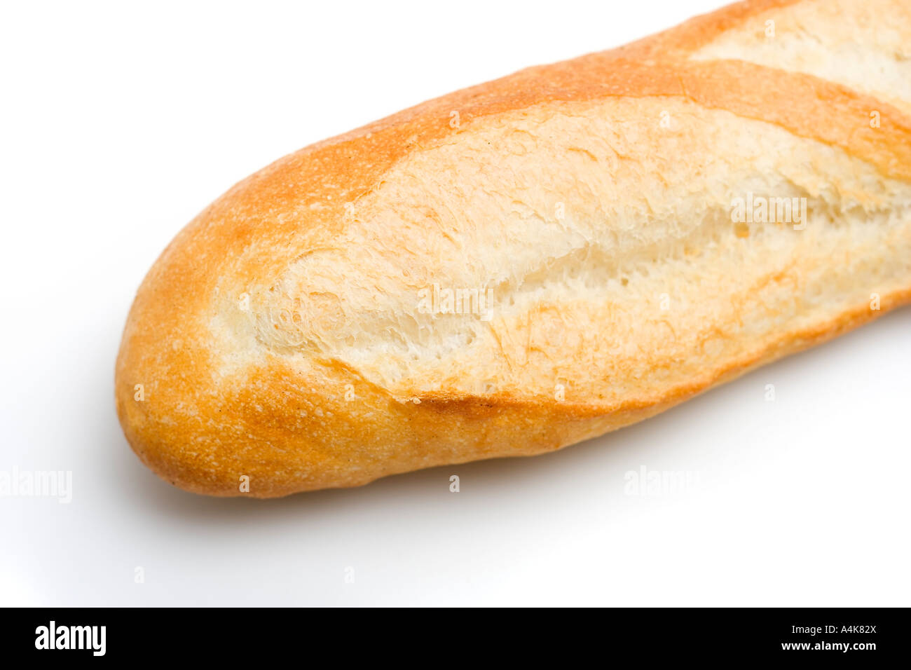 Closeup view of two french bread baguettes on a white background ...