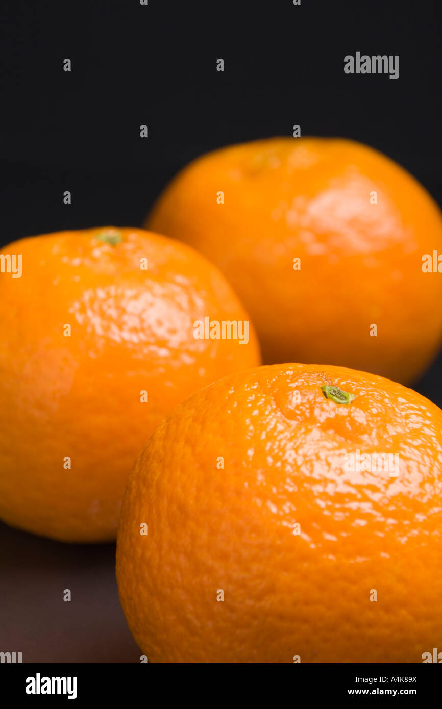 Close up view of three tangerines (shallow DOF Stock Photo - Alamy