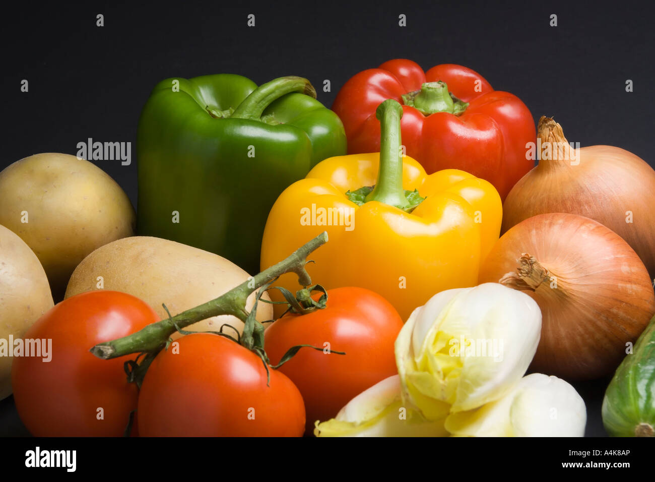 Various fresh vegetables on a dark background Stock Photo - Alamy