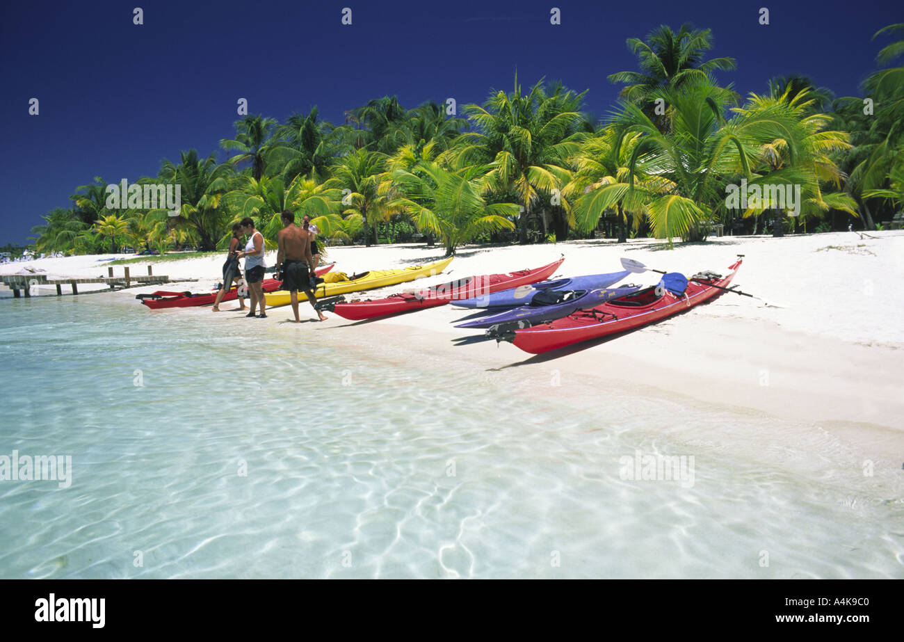 Sea kayaks on beach in Roatan island Honduras Stock Photo - Alamy