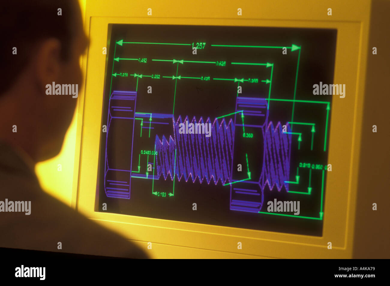 design engineer studying schematic on computer screen Stock Photo - Alamy