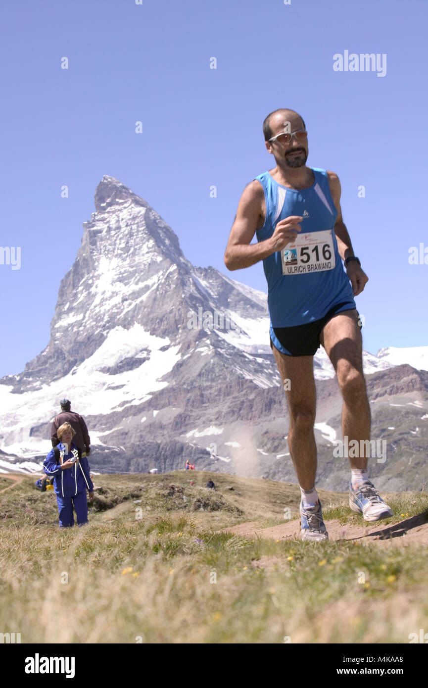 Runners in the Zermatt Marathon infront of the Matterhorn Switzerland ...