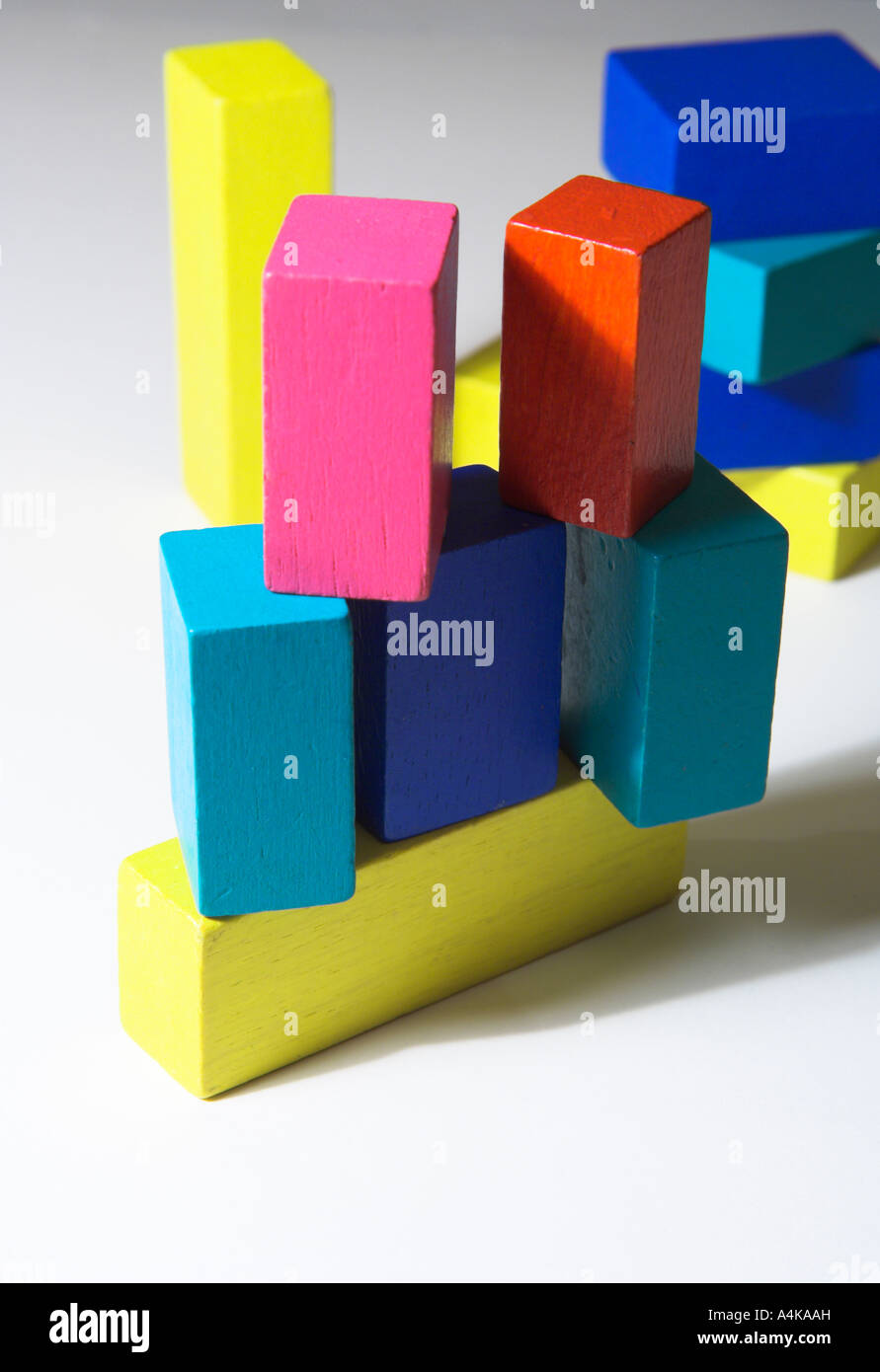 Childrens educational wooden building blocks shapes Stock Photo - Alamy