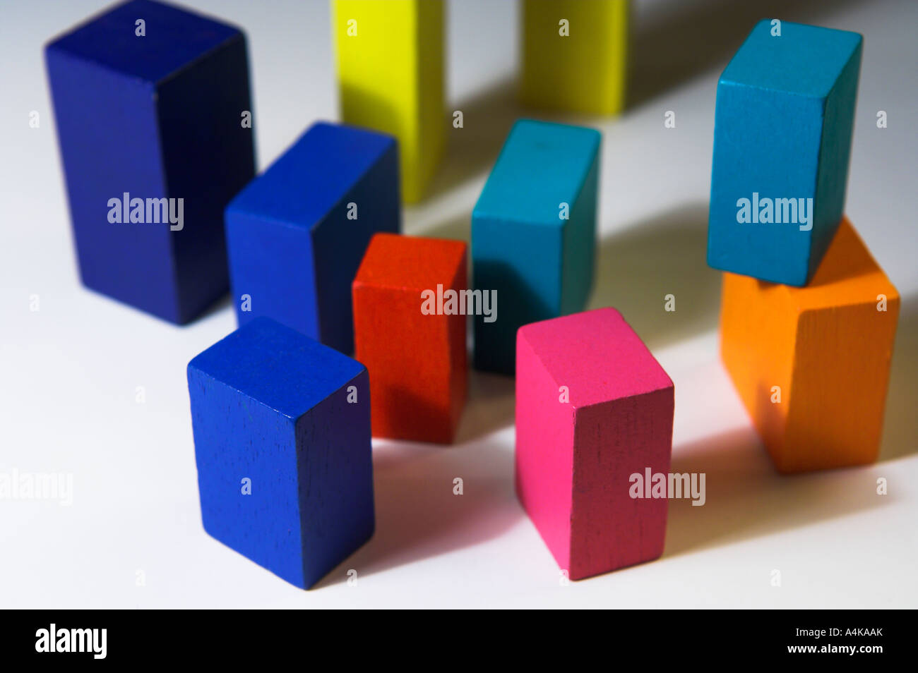 Childrens educational wooden building blocks shapes Stock Photo - Alamy