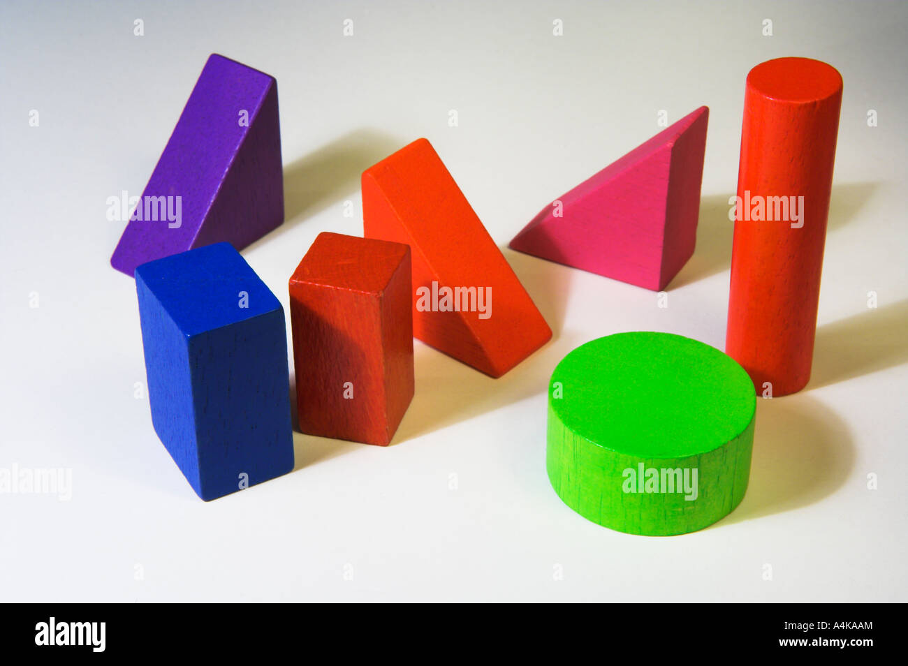 Childrens educational wooden building blocks shapes Stock Photo - Alamy