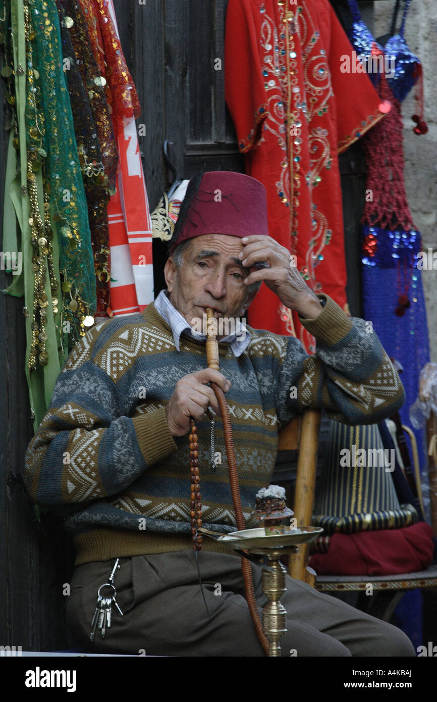 Lebanese man smoking nargileh pipe hi-res stock photography and images ...
