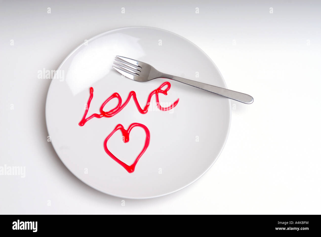plate with love written on it Stock Photo - Alamy