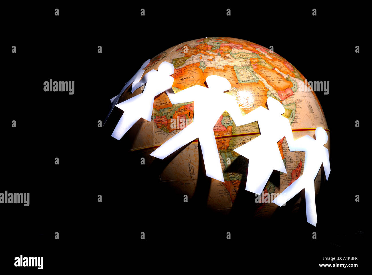 man and woman cut out figures circle globe Stock Photo - Alamy