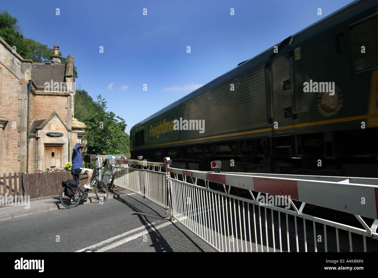 3rd August 2006. Freightliner diesel train at a level crossing in ...
