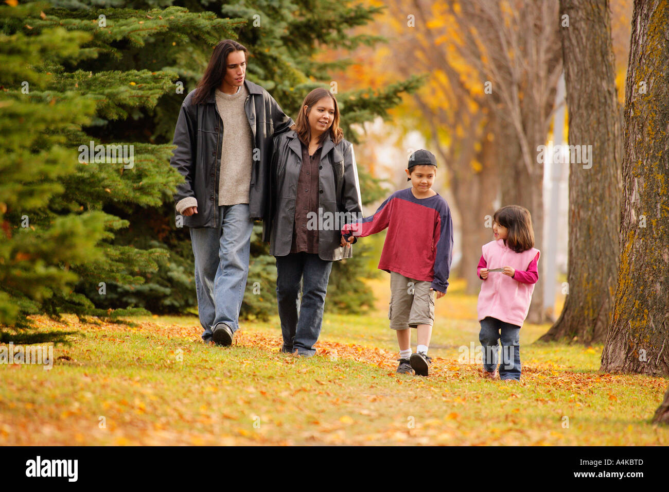 Family walking together Stock Photo - Alamy
