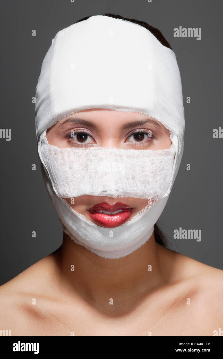 Woman with bandages Stock Photo - Alamy