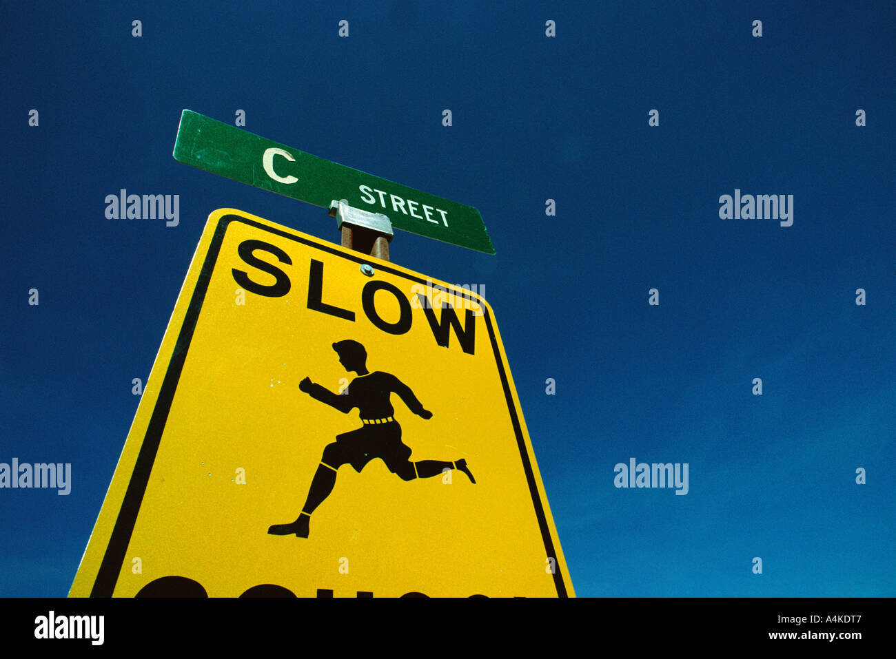 Slow children playing road sign hi-res stock photography and images - Alamy