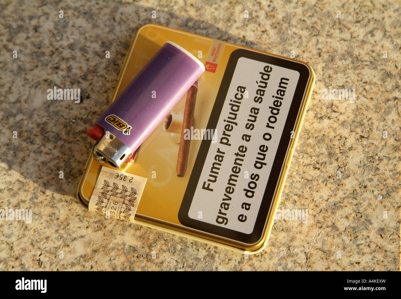 cigarillos box and lighter Stock Photo - Alamy