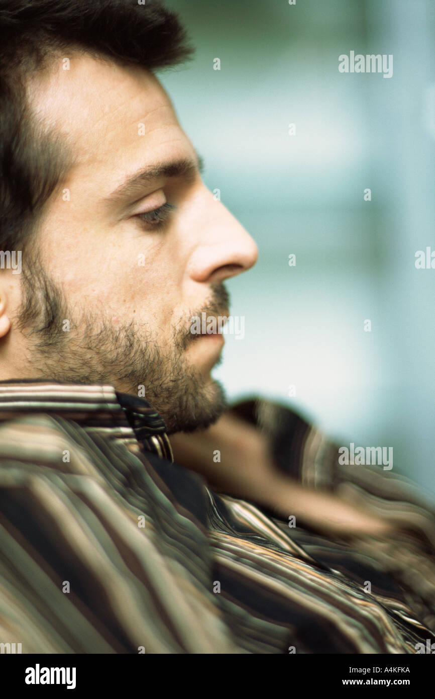 Young man, side view Stock Photo - Alamy
