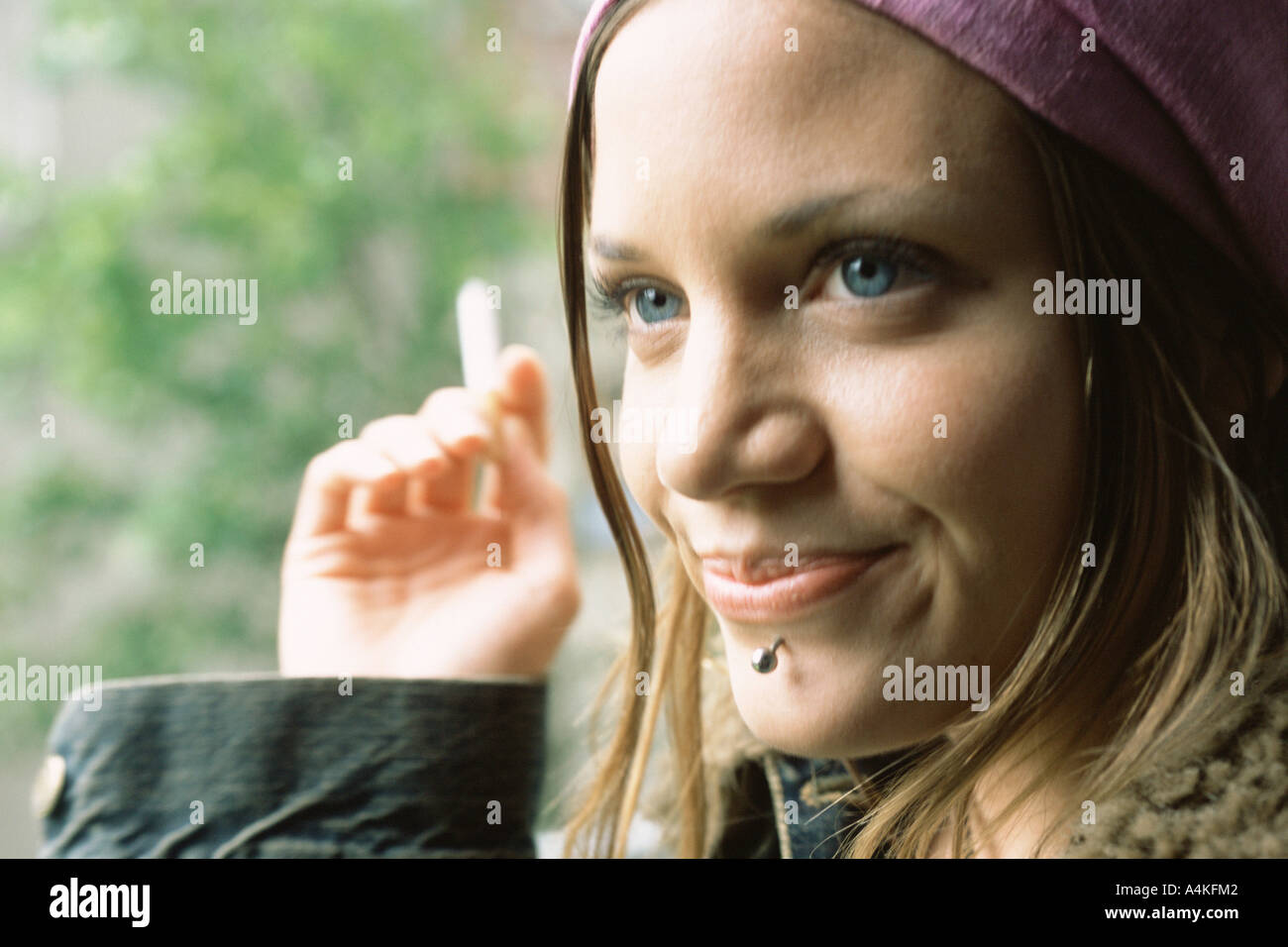 Close up young woman face piercings hi-res stock photography and images ...