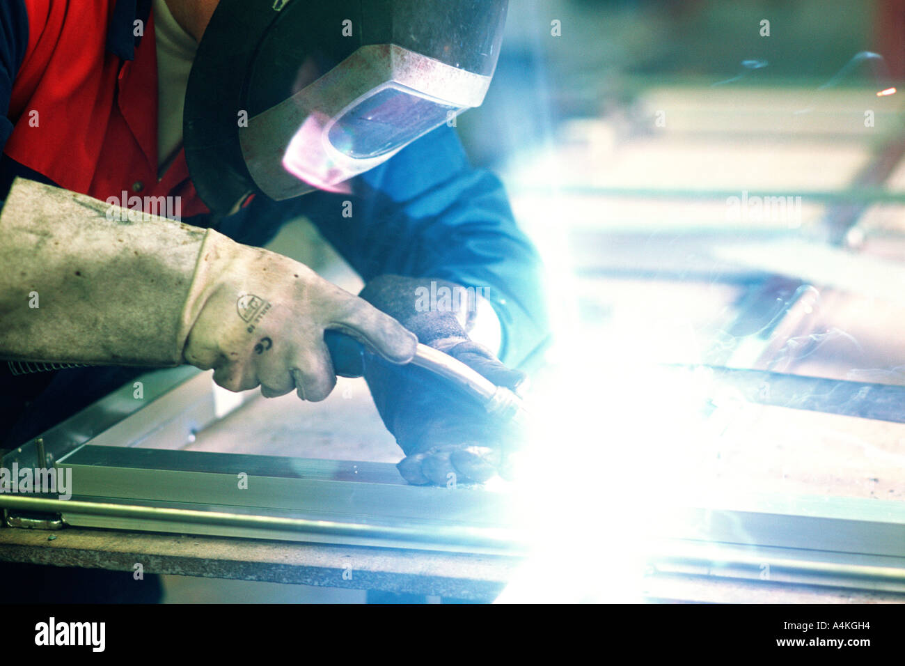 Worker welds factory close up hi-res stock photography and images - Alamy