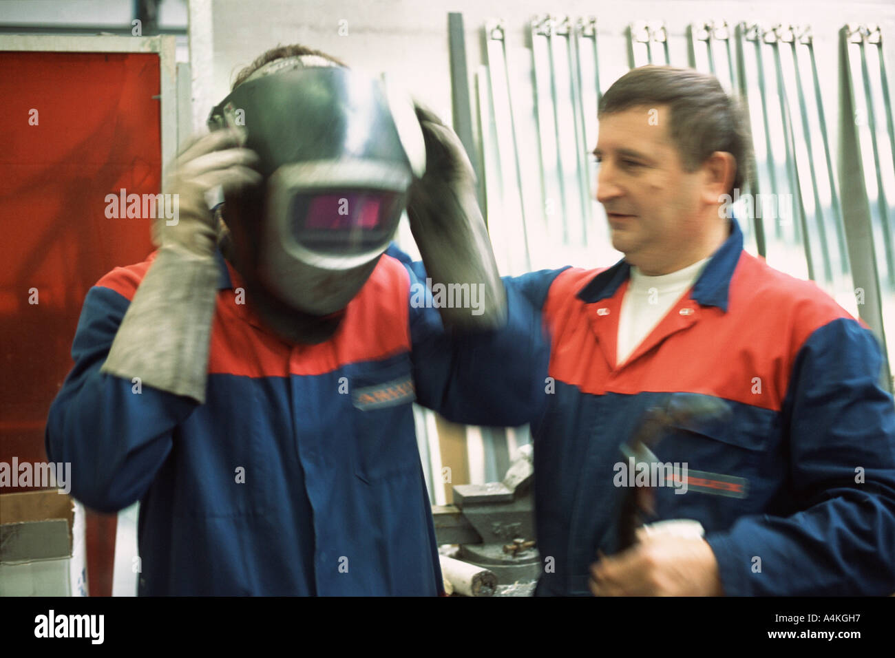 Welder and apprentice Stock Photo - Alamy