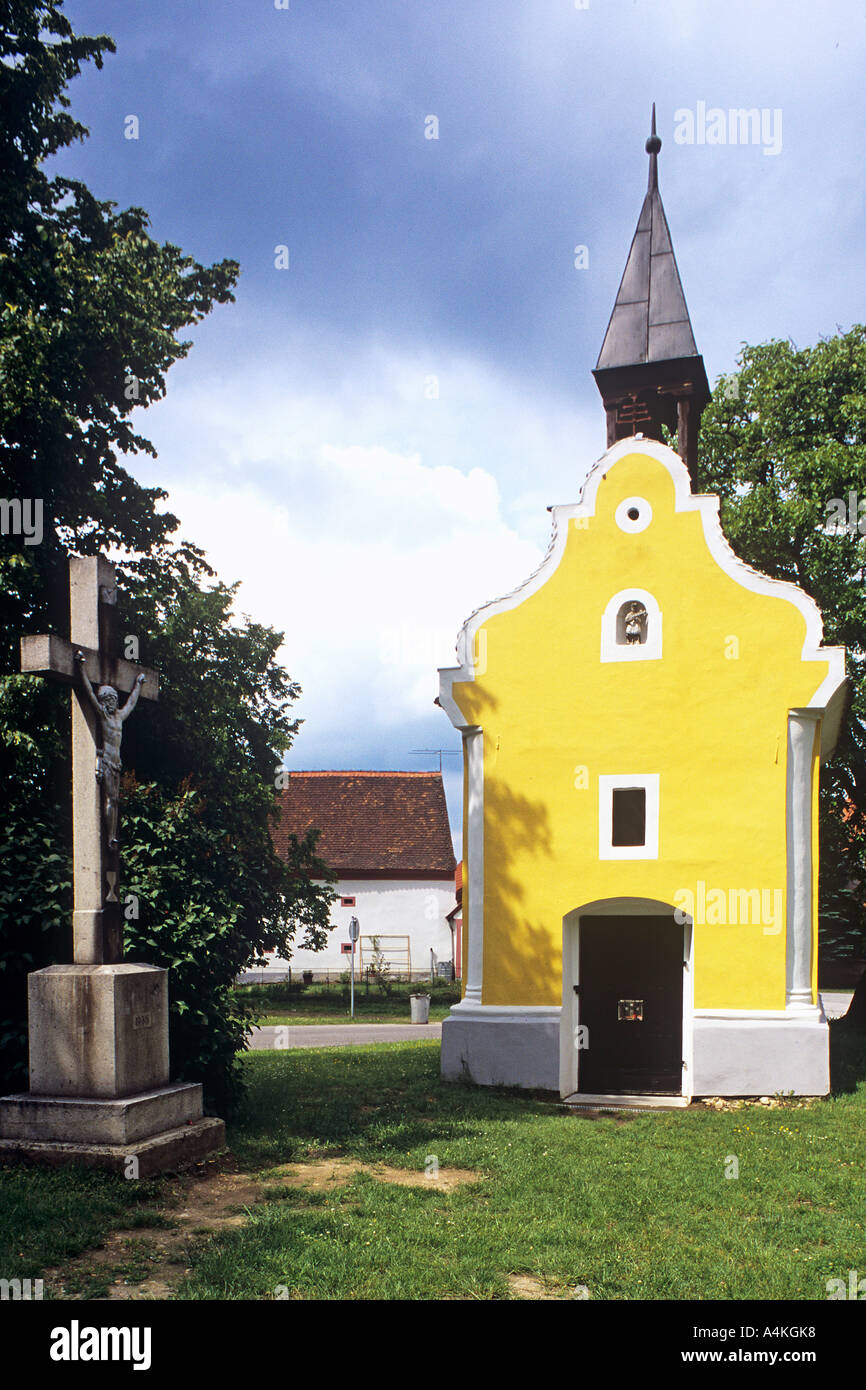 Yellow building in graveyard Stock Photo - Alamy