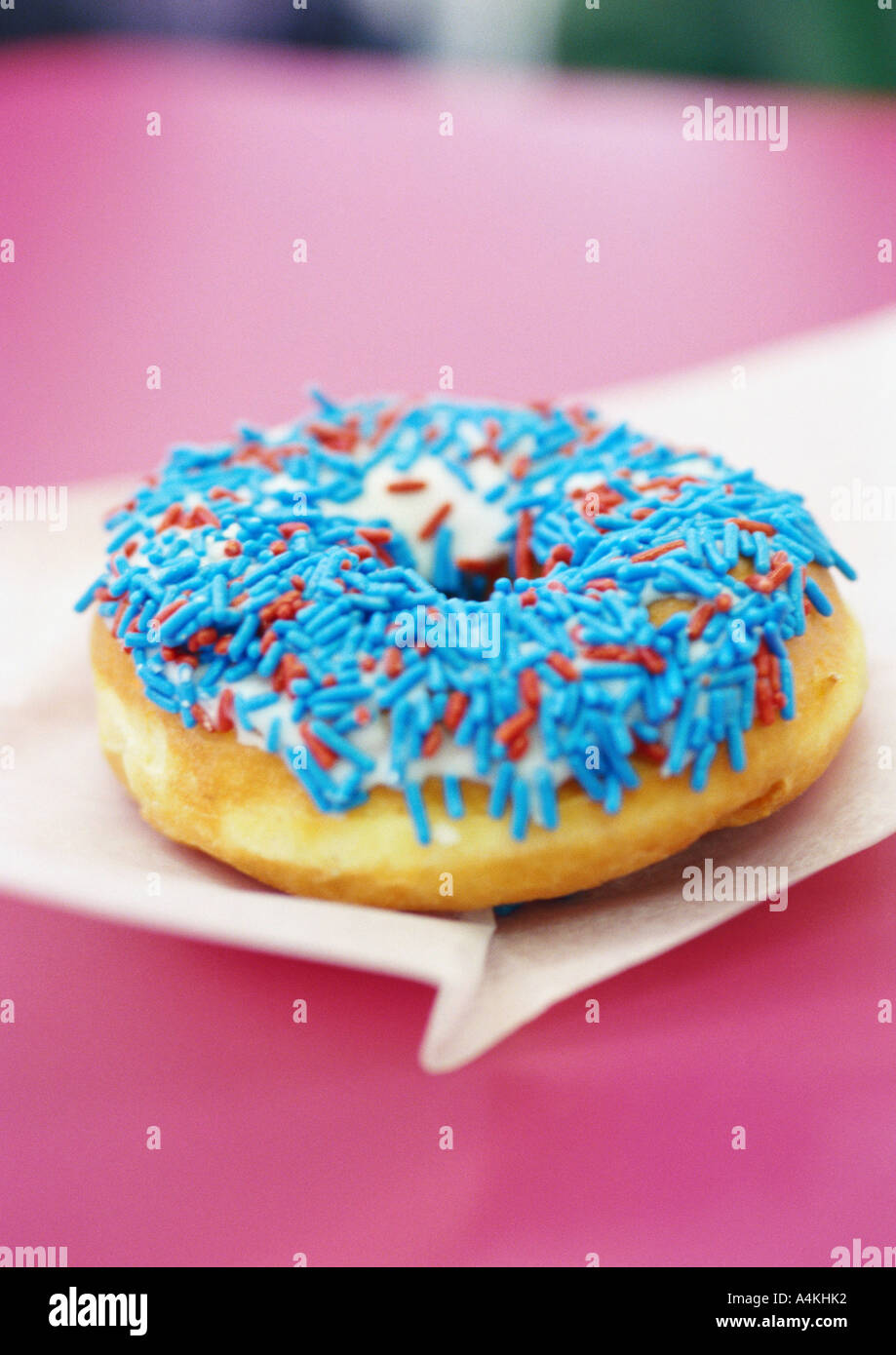 Donut with sprinkles Stock Photo - Alamy