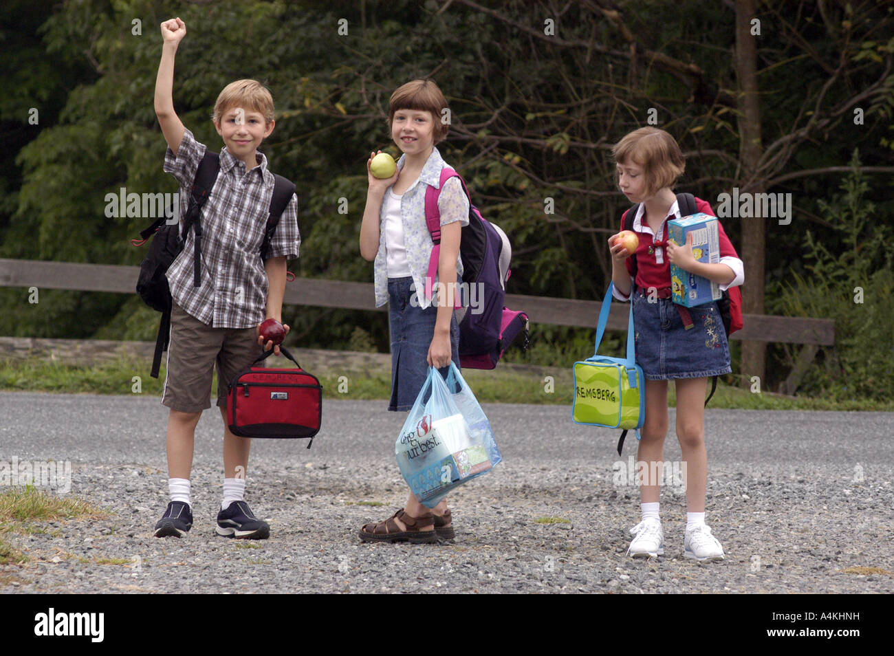 Children heading off to first day of school Stock Photo - Alamy
