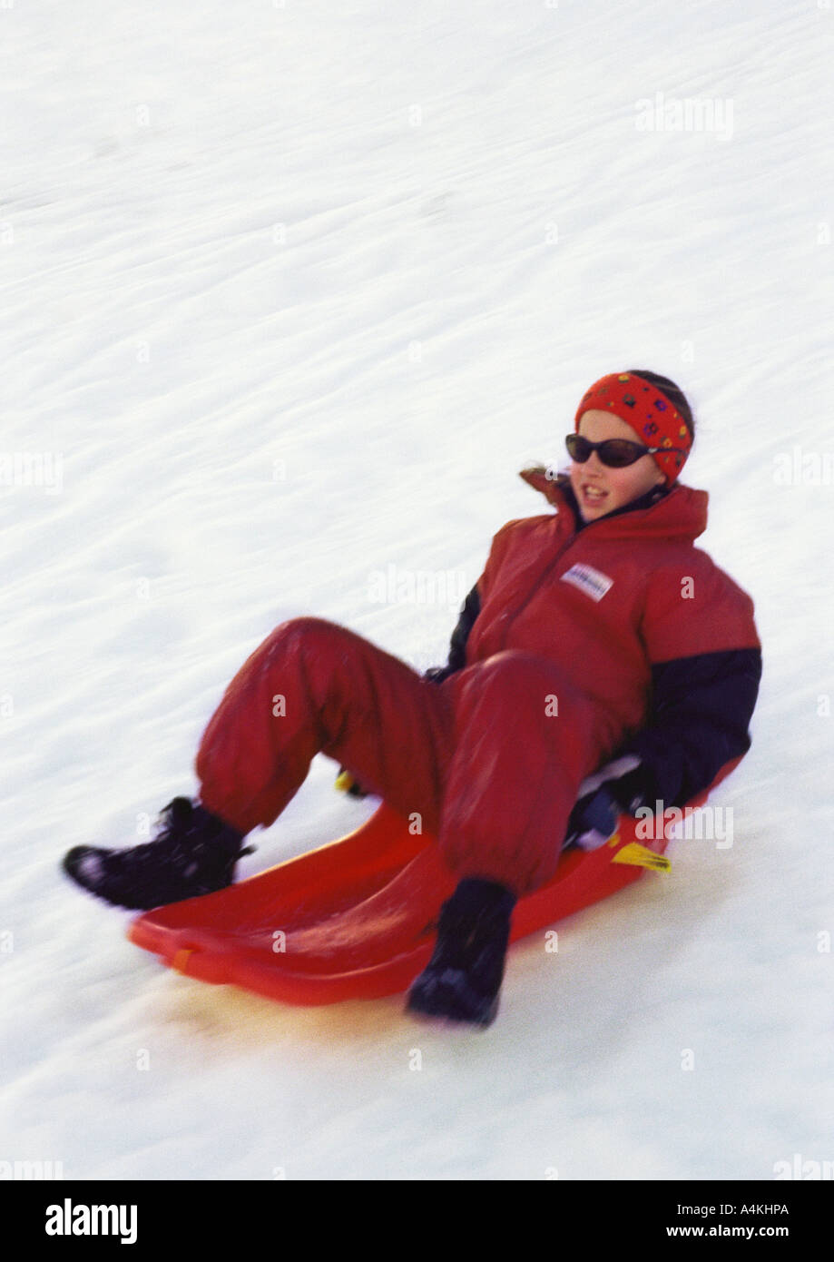 Children tobogganing at sled mountain hi-res stock photography and ...
