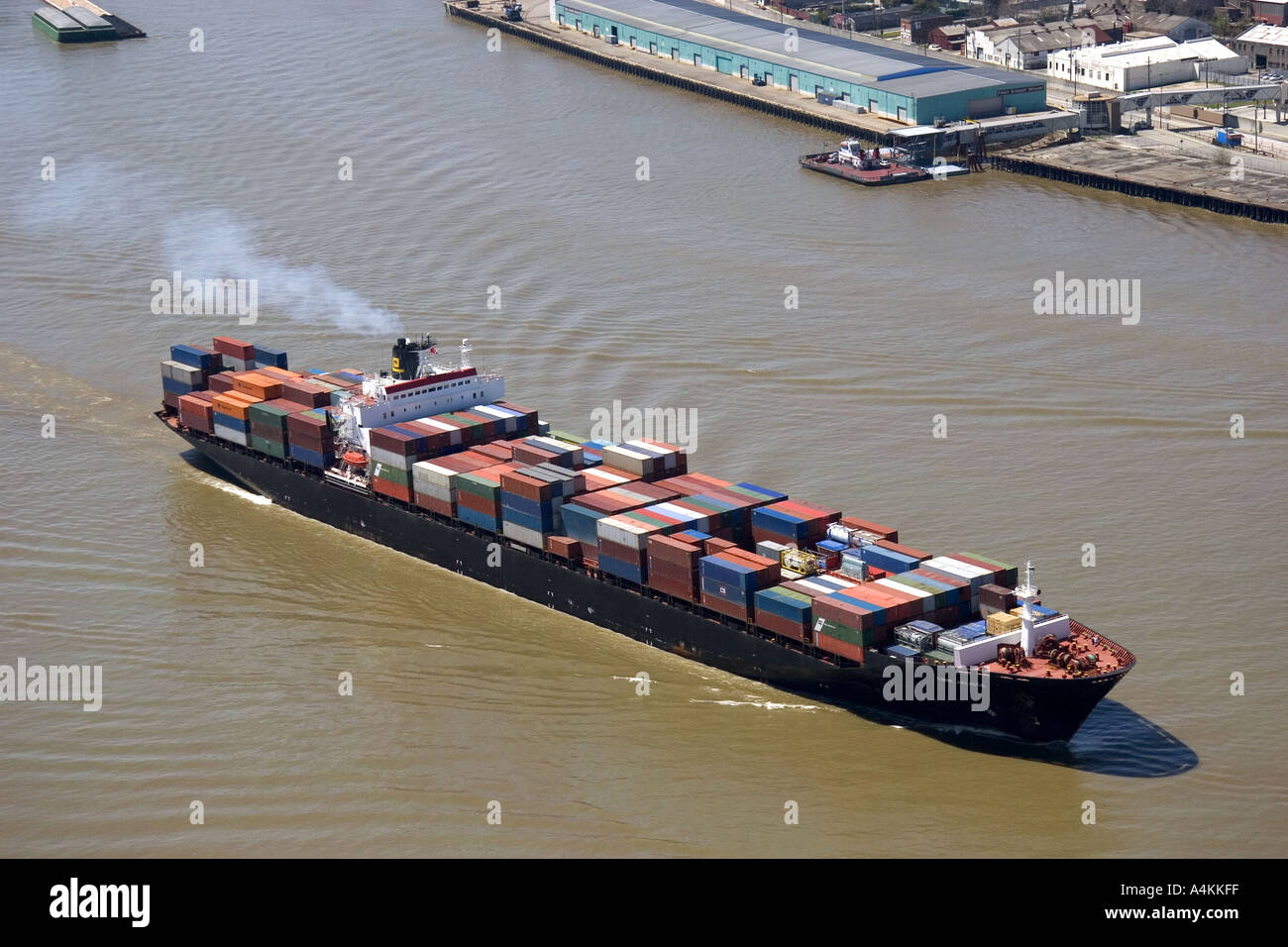 Container ship on the Mississippi River departing New Orleans Louisiana ...