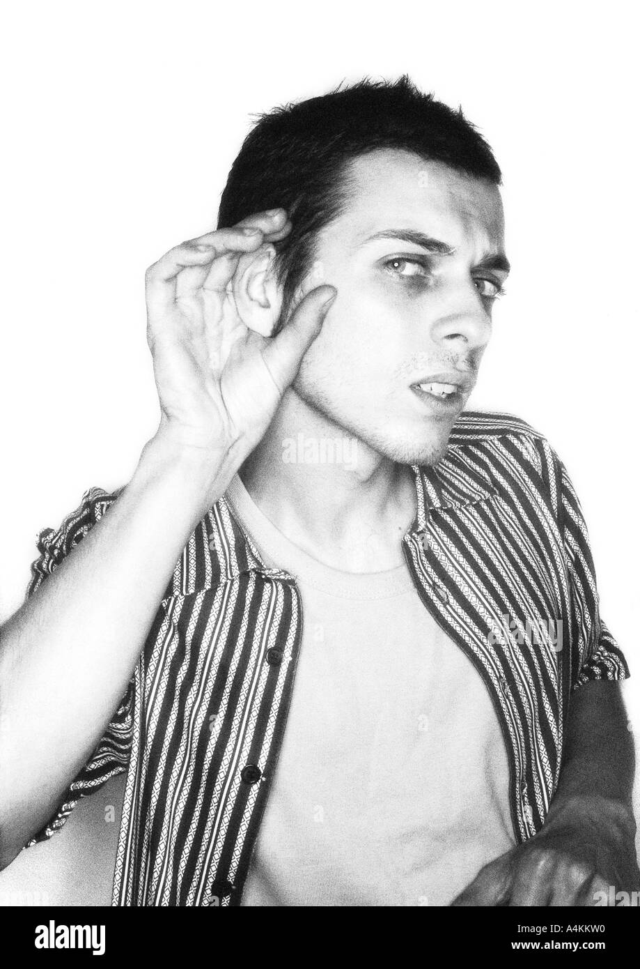 Hand cupped to ear hi-res stock photography and images - Alamy