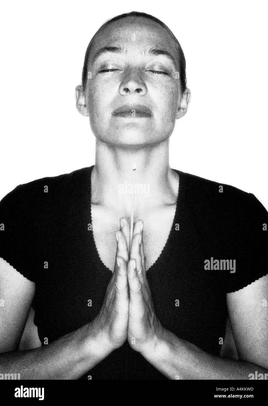 Woman praying, portrait Stock Photo - Alamy