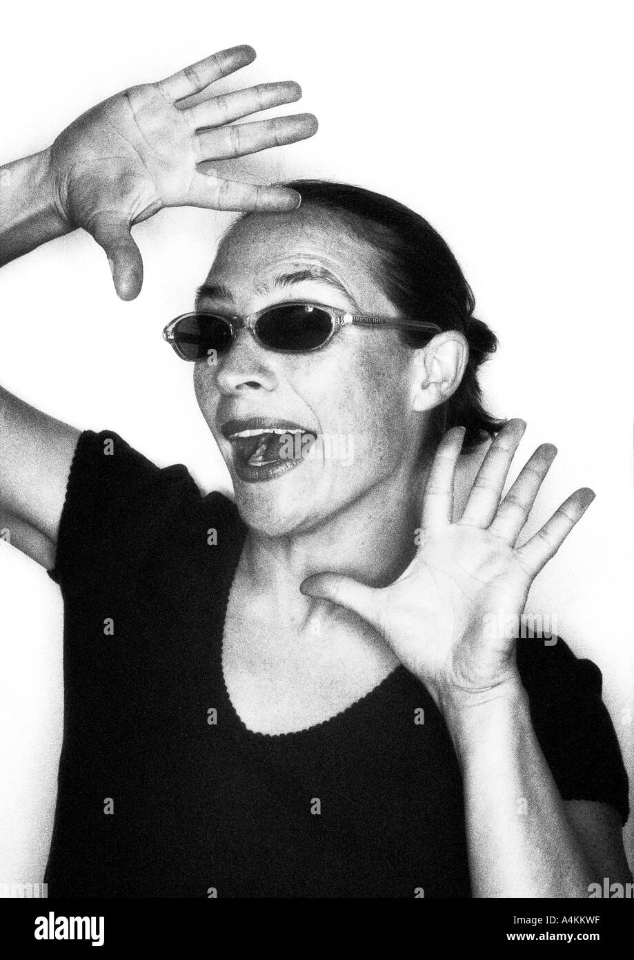 Woman hand head wearing Black and White Stock Photos & Images - Alamy