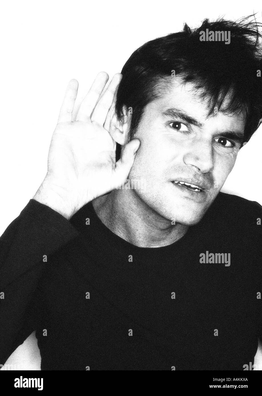 Hand behind ear Black and White Stock Photos & Images - Alamy