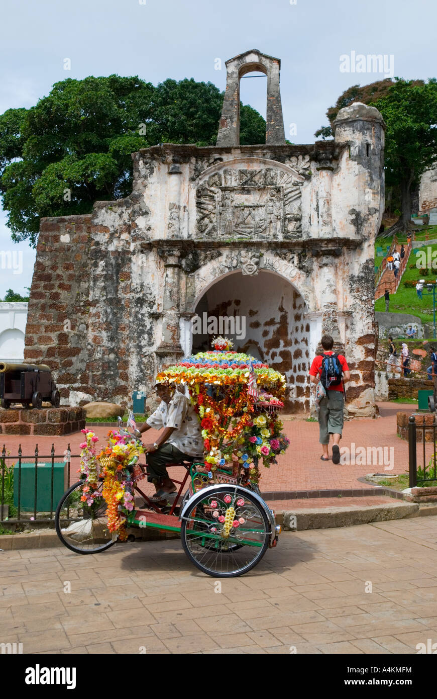 Colourfully decorated trishaws outside the a Famosa Portuguese fort in ...