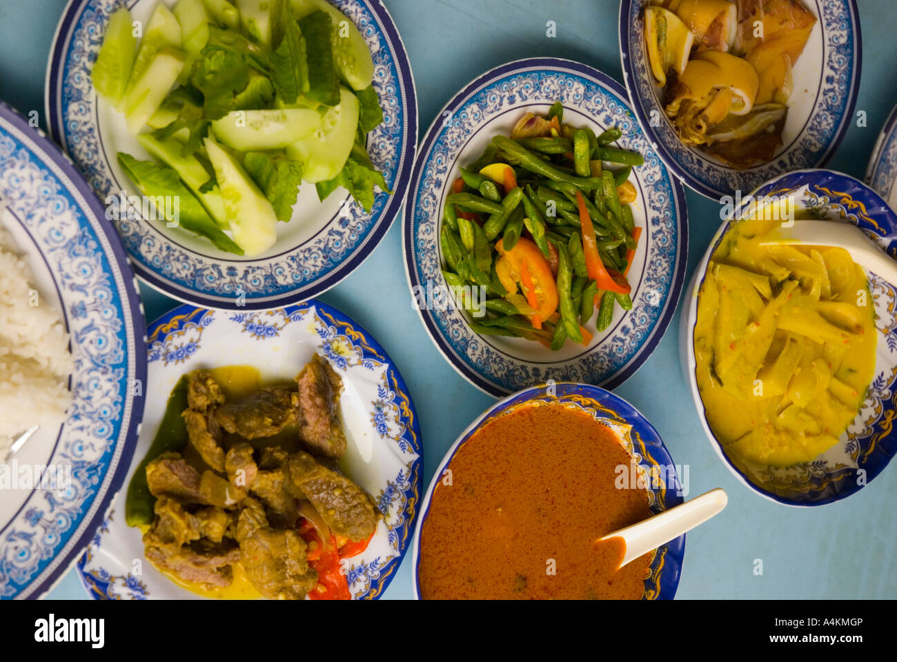 A selection of Malaysian curries at a Malaccan restuarant Stock Photo ...